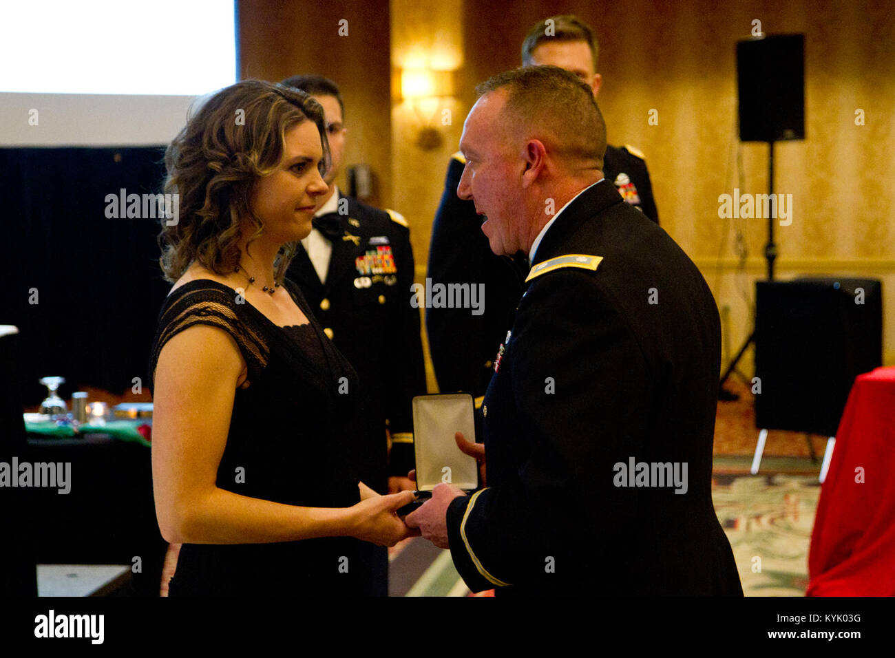 The Order of Saint Maurice is presented to Christi Cole, wife of Lt. Col. Jeffrey Cole during ...