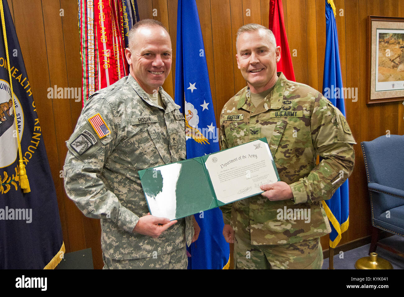 Brig. Gen. Stephen R. Hogan swears in Col. Thomas Gaston Jr. during a ...