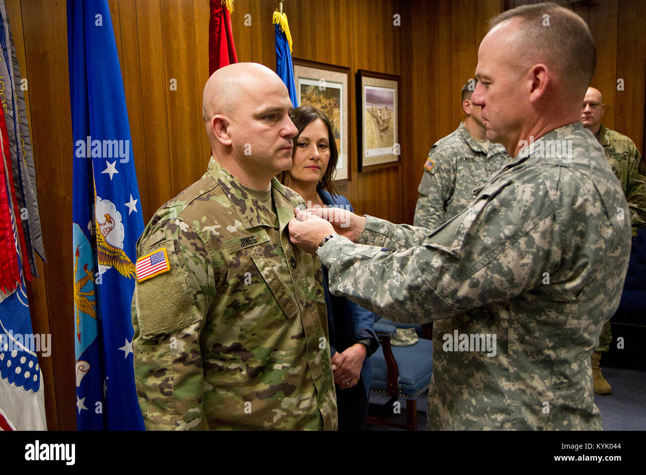 Brig. Gen. Stephen R. Hogan presents Sgt. 1st Class James Jones with an ...
