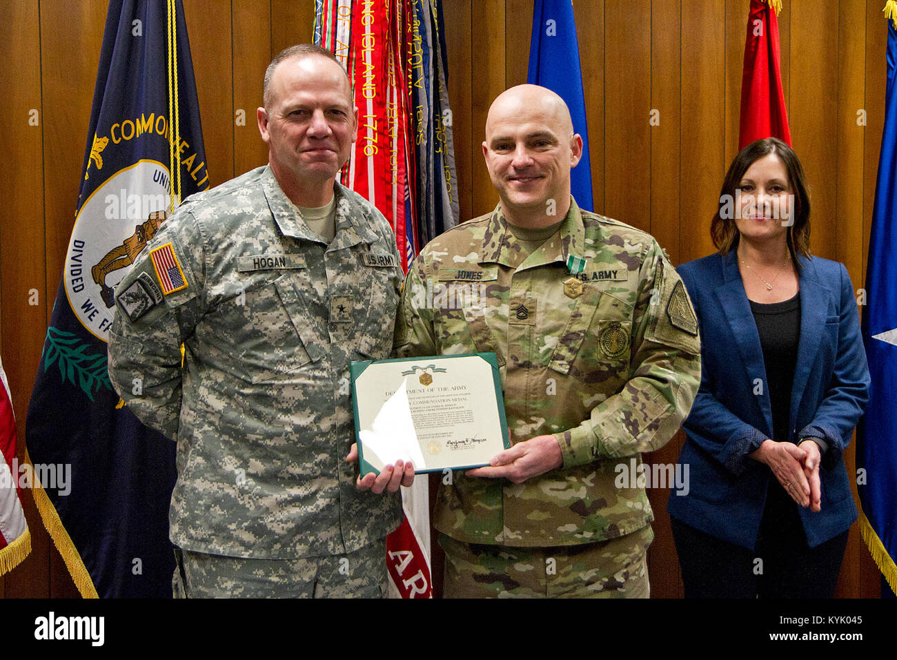 Brig. Gen. Stephen R. Hogan presents Sgt. 1st Class James Jones with an ...