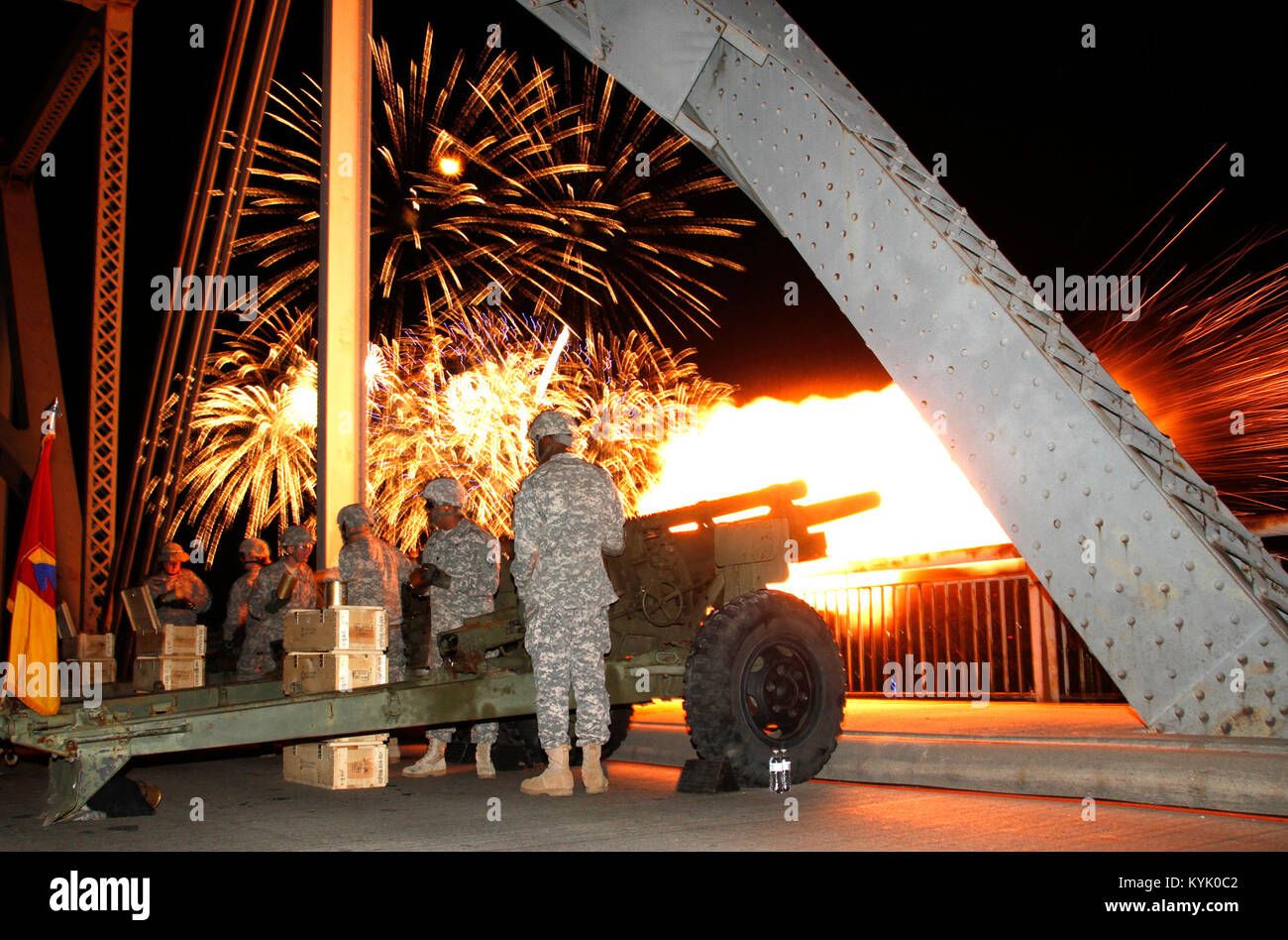 Soldiers from the 138th Field Artillery Brigade fire cannons from the ...