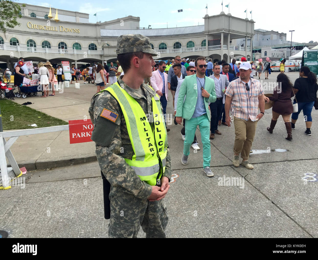 Pfc. Kevin Justice with the 198th Military Police Battalion assists ...