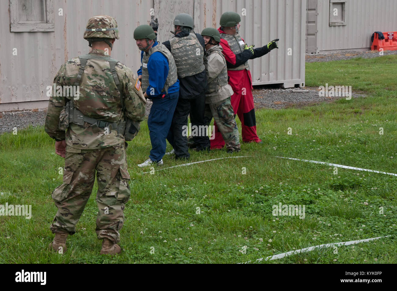 During Operation Immersion, medical professionals execute a mock combat ...