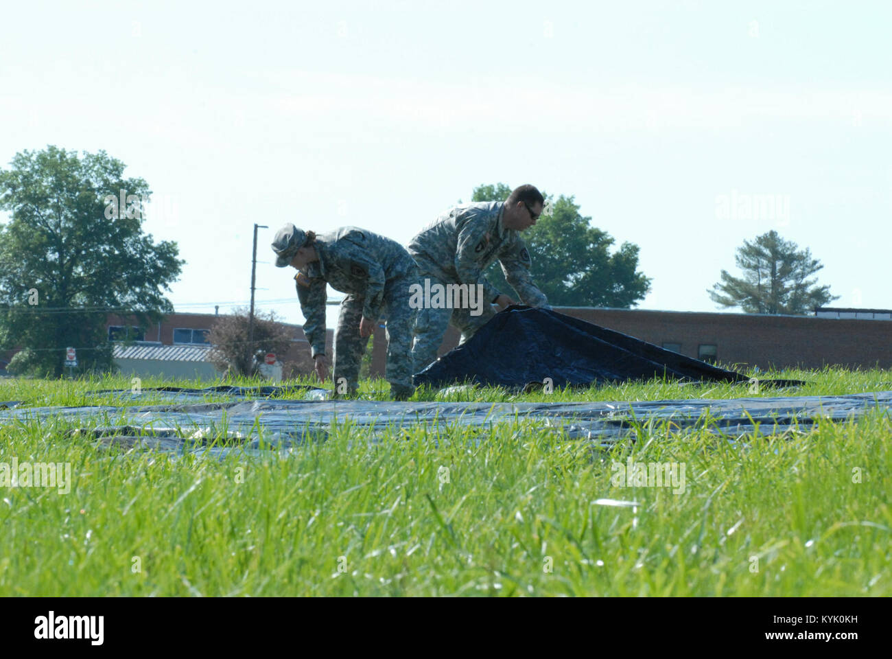 US military army National Guard training and assisting Stock Photo - Alamy
