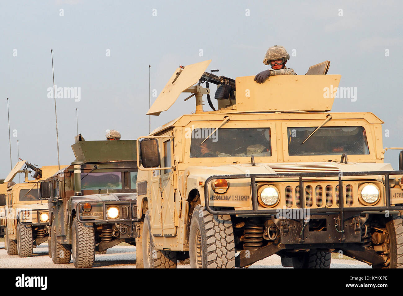 Soldiers with the 198th Military Police Battalion move as an assault ...