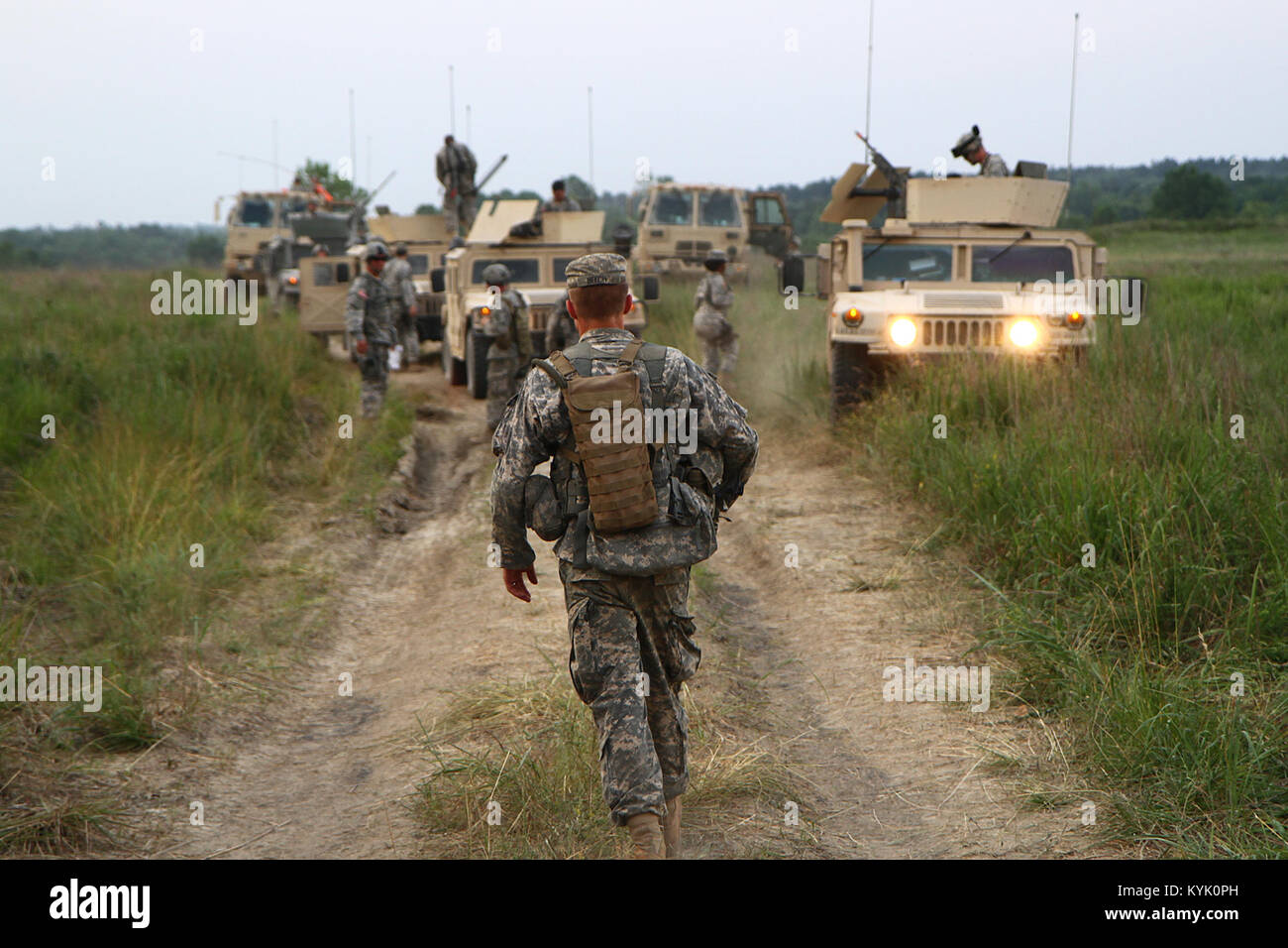 Soldiers with the 198th Military Police Battalion fall back after ...
