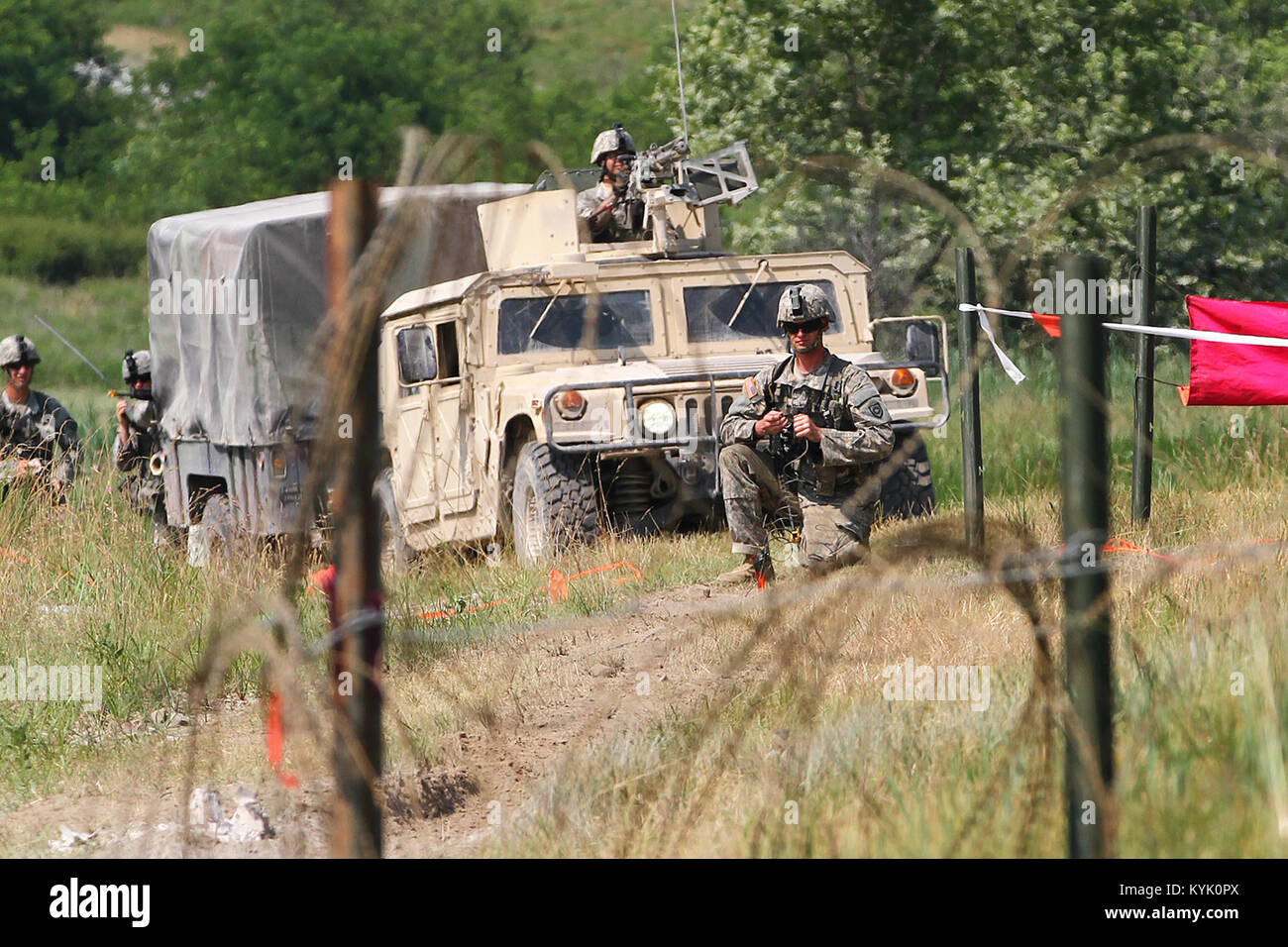 A Soldier with the 1123rd Sapper Company prepares to breach an obstacle ...