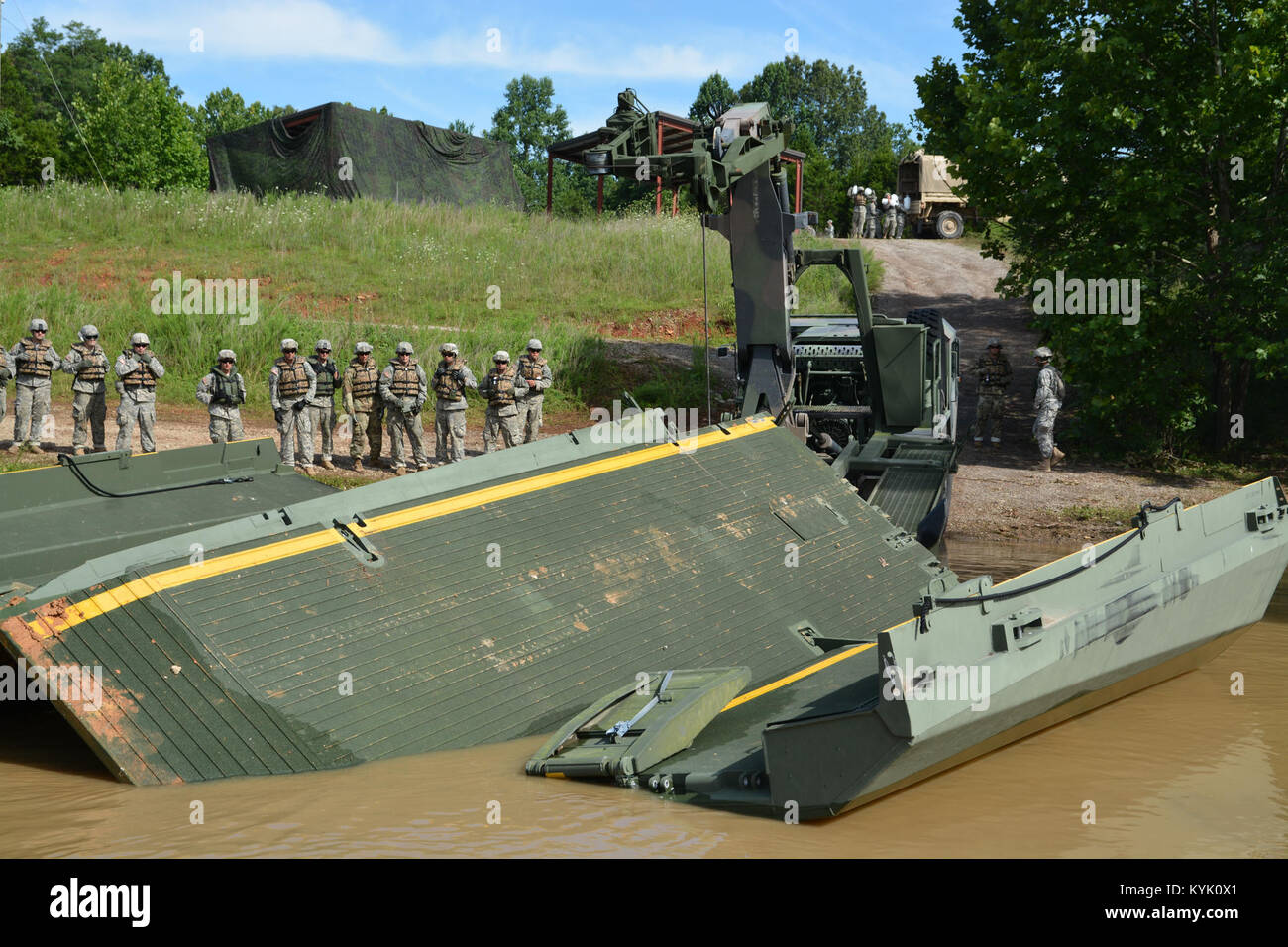 Soldiers of the 2061st Multi Role Bridge Company recover an interior ...