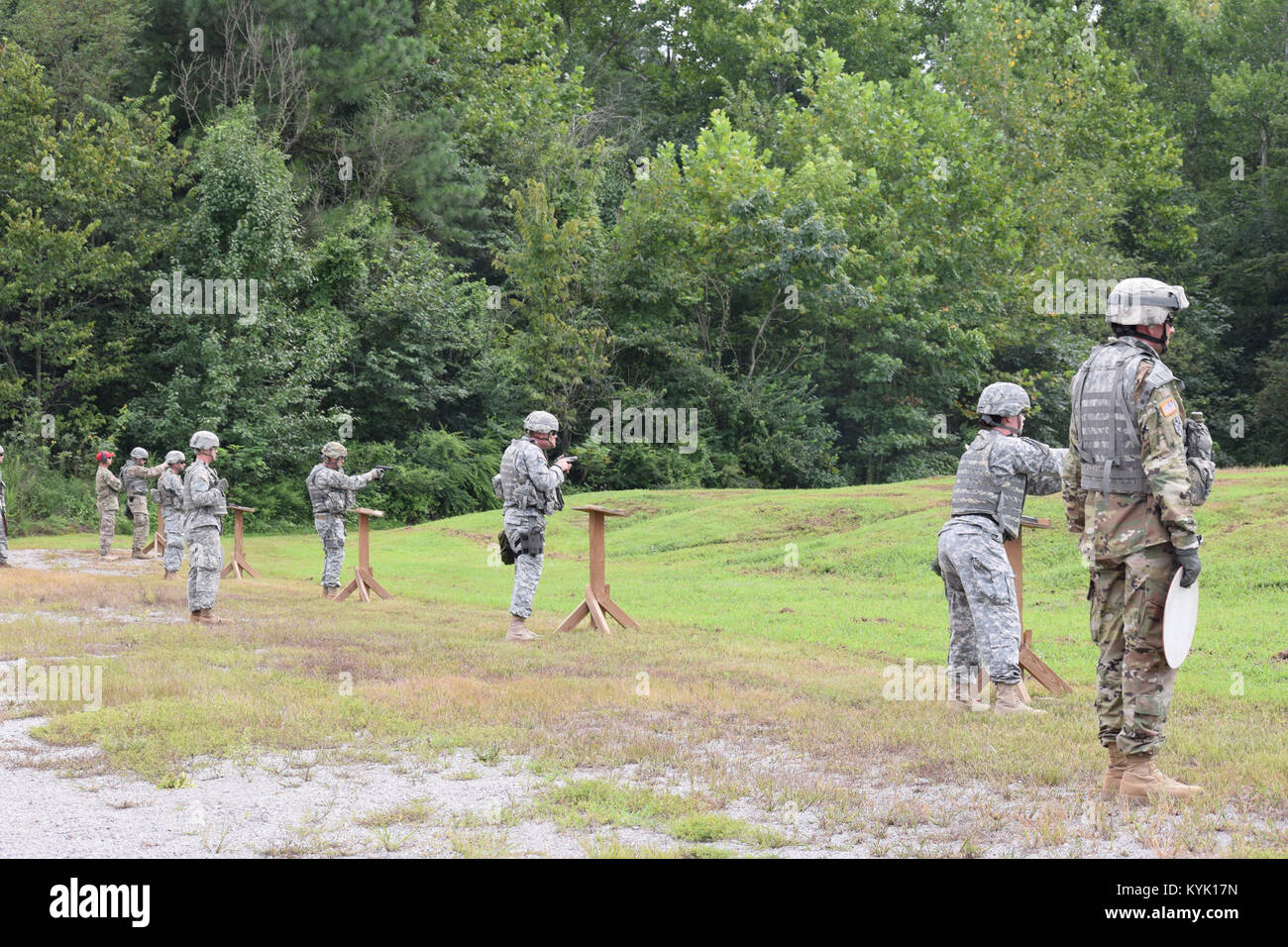 Soldiers of the 149th Military Engagement Team qualify with their M9 ...