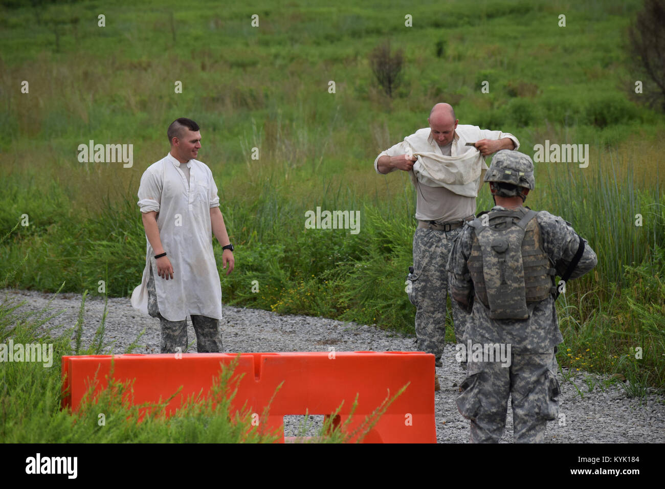 Soldiers of the 149th Military Engagement Team conduct entry control ...