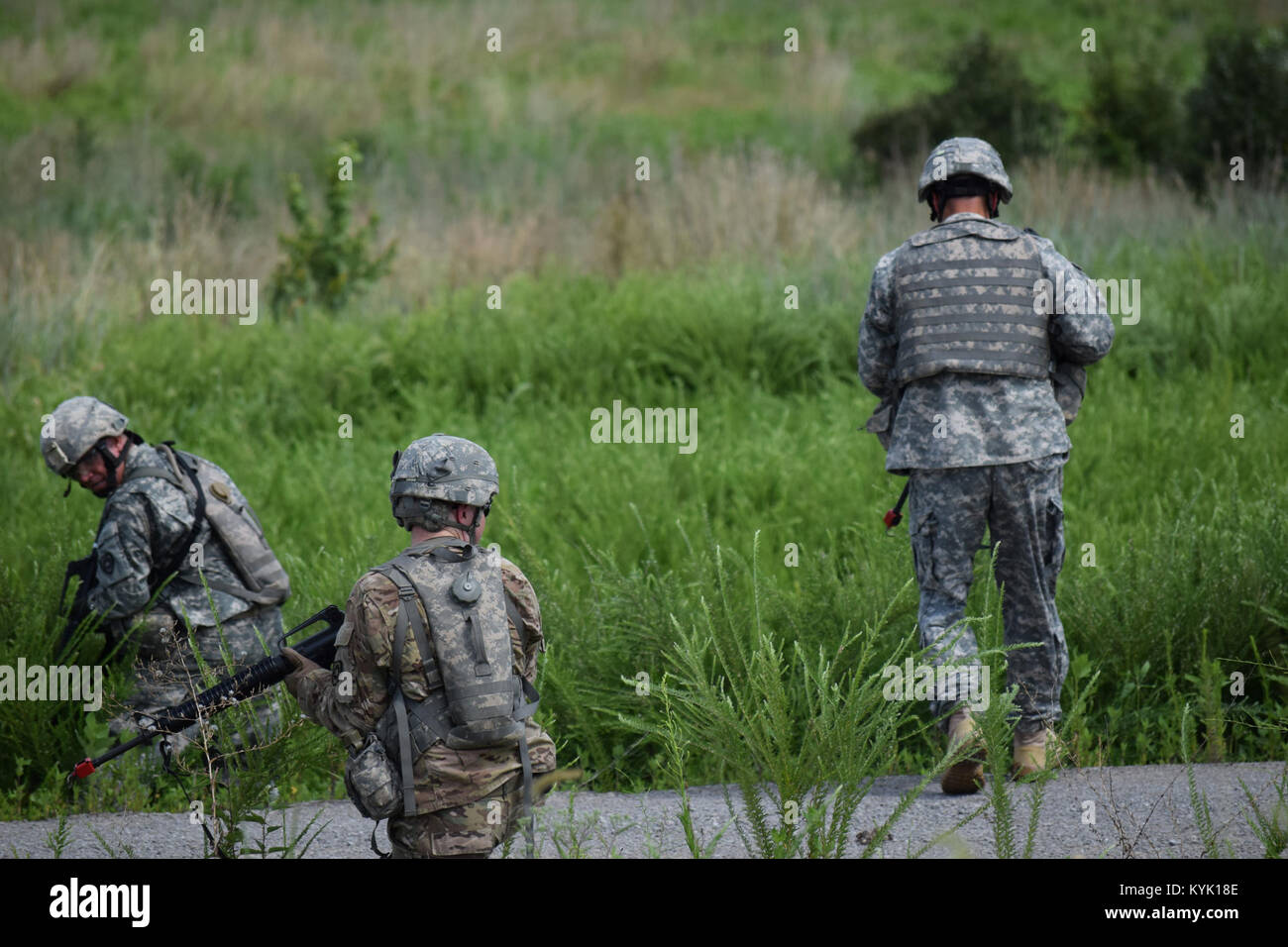Soldiers of the 149th Military Engagement Team conduct squad movements ...