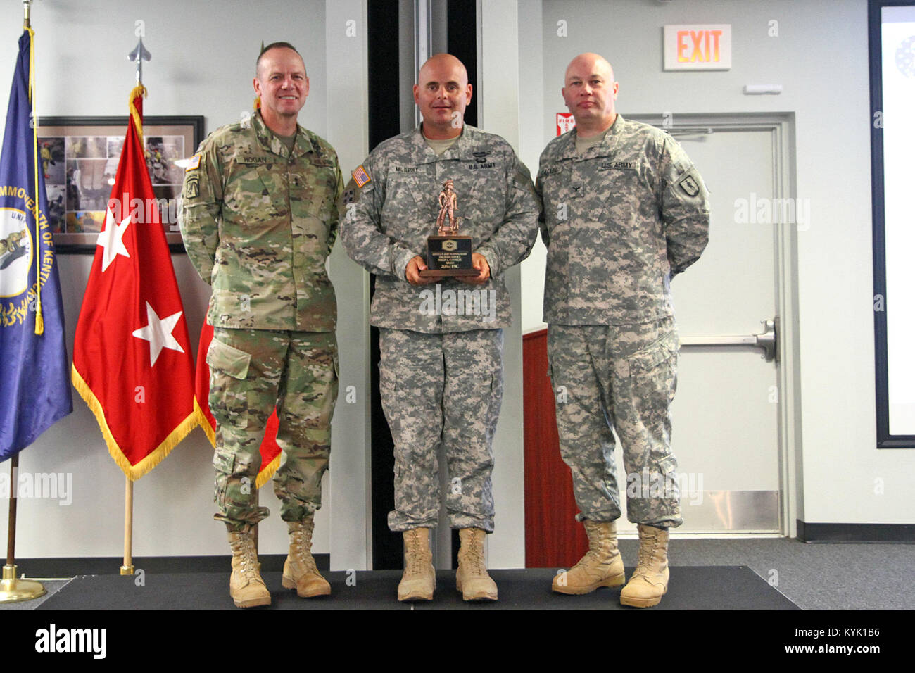 Sgt. 1st Class Marcus Murphy accepts the Philip Connelly Award for Food ...