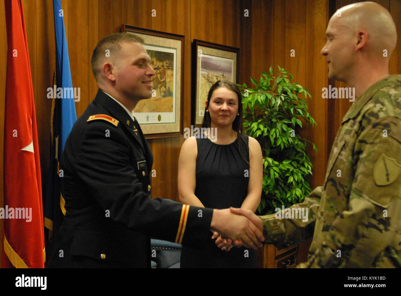 Newly commissioned 2nd Lt. Forrest takes his first salute from NCO Sgt ...