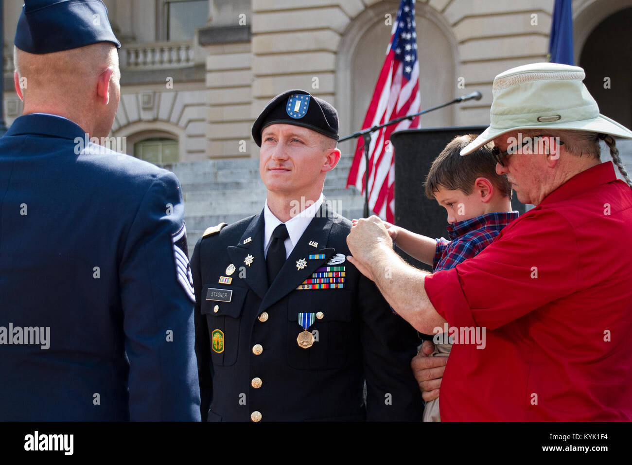 2nd Lt. Cody Stagner is pinned by his son during Kentucky's Officer ...