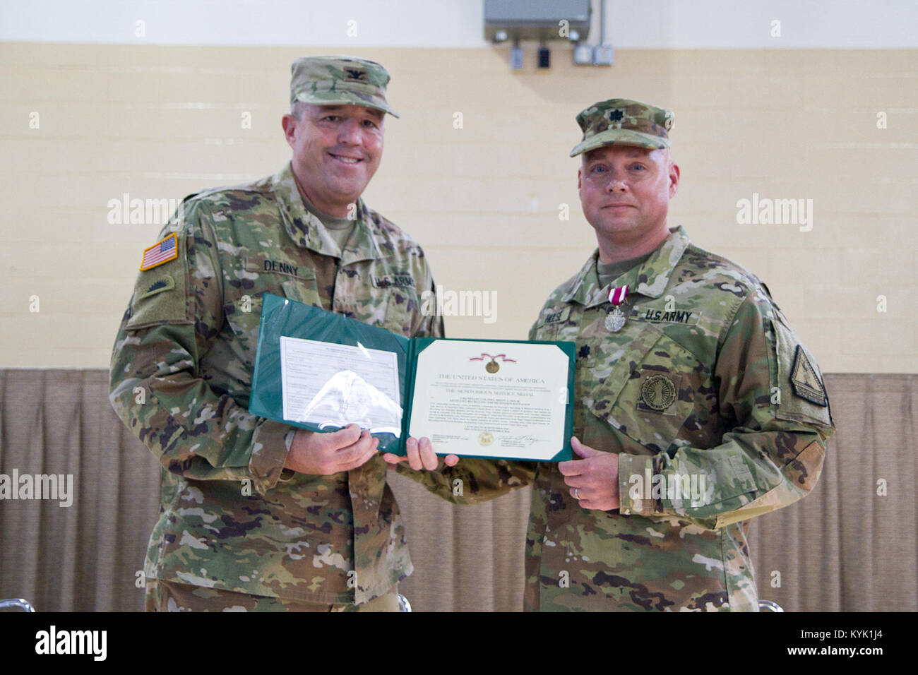 Col. William A. Denny presents Lt. Brent Hulse with the Meritorious ...