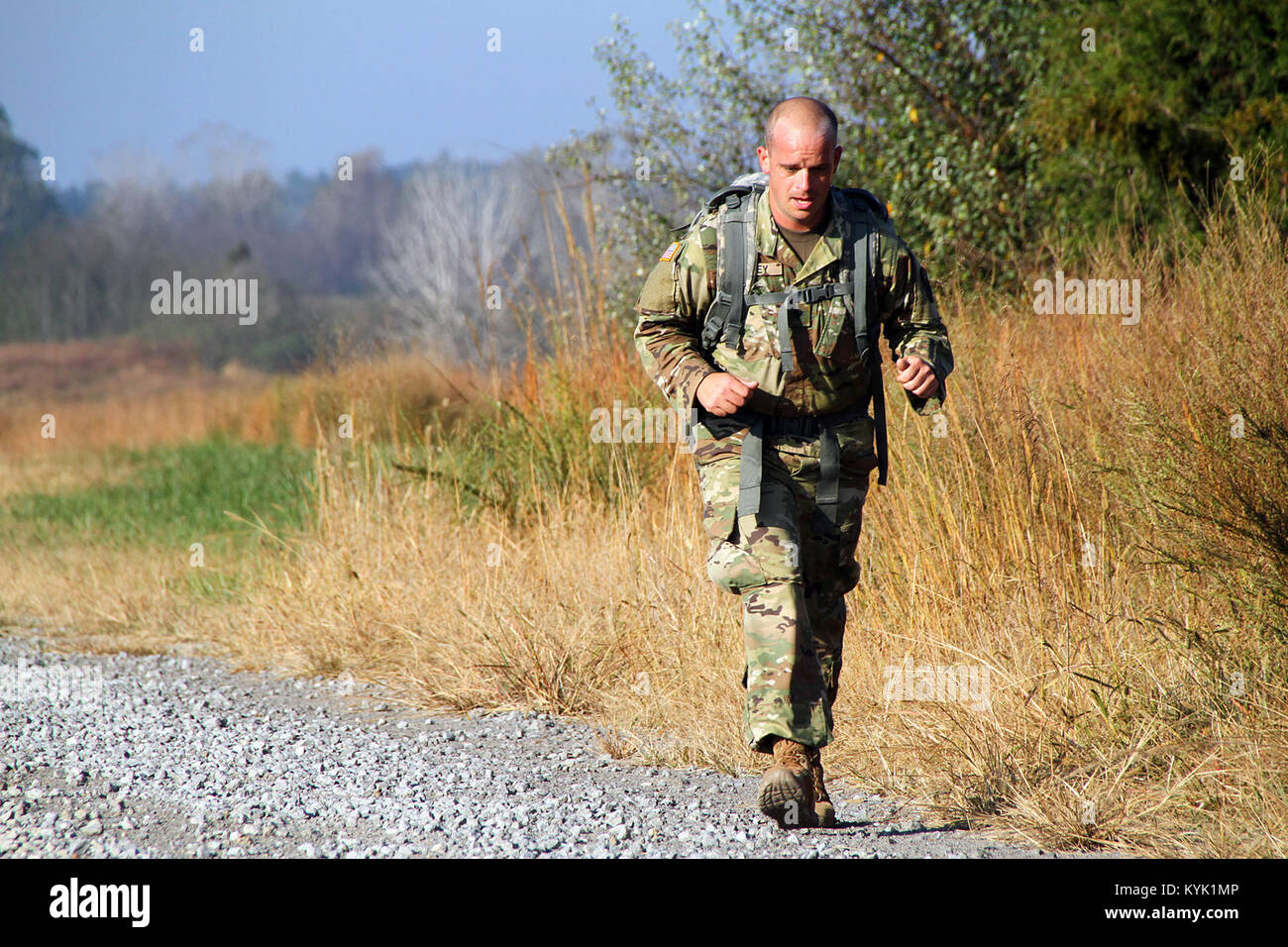 Spc. James Alvey runs during the 10-mile road march the Kentucky Army ...