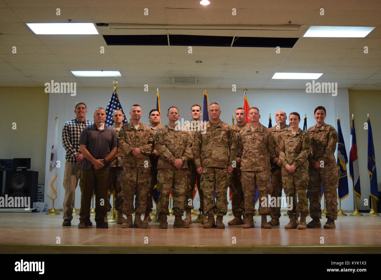 Members of the 149th Military Engagement Team pose for a photo after ...