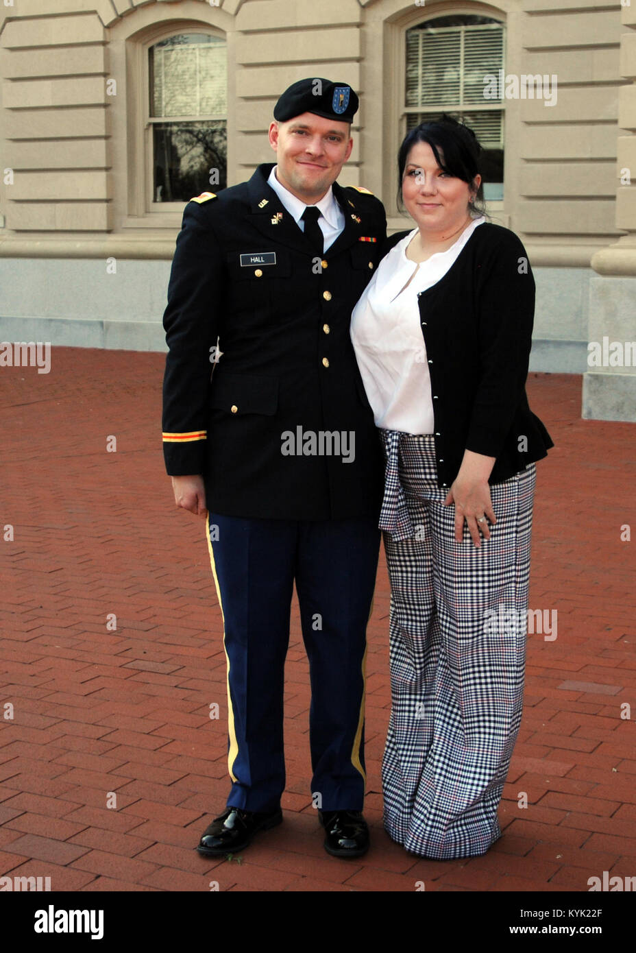 Newly promoted 2nd Lt. Jeremy Hall poses with his wife, Jennifer Hall ...