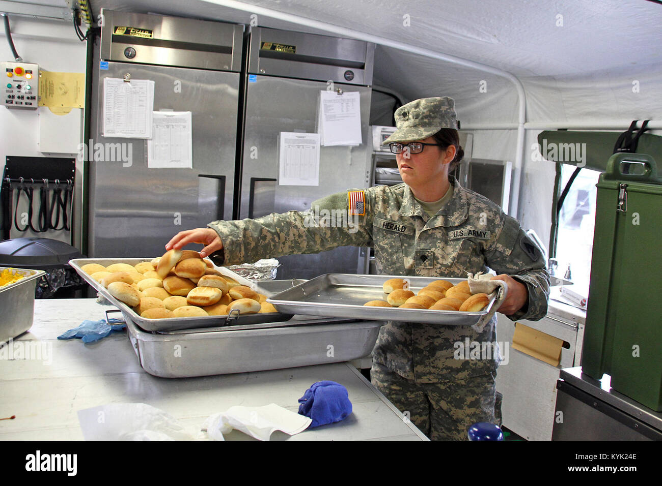 Spc. Juanita Herald with the 2112th Mess Team competes in the ...