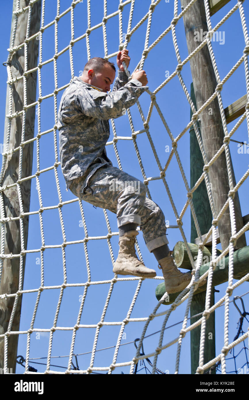 Spc. Yaimel Olivares with the Puerto Rico National Guard descends an ...