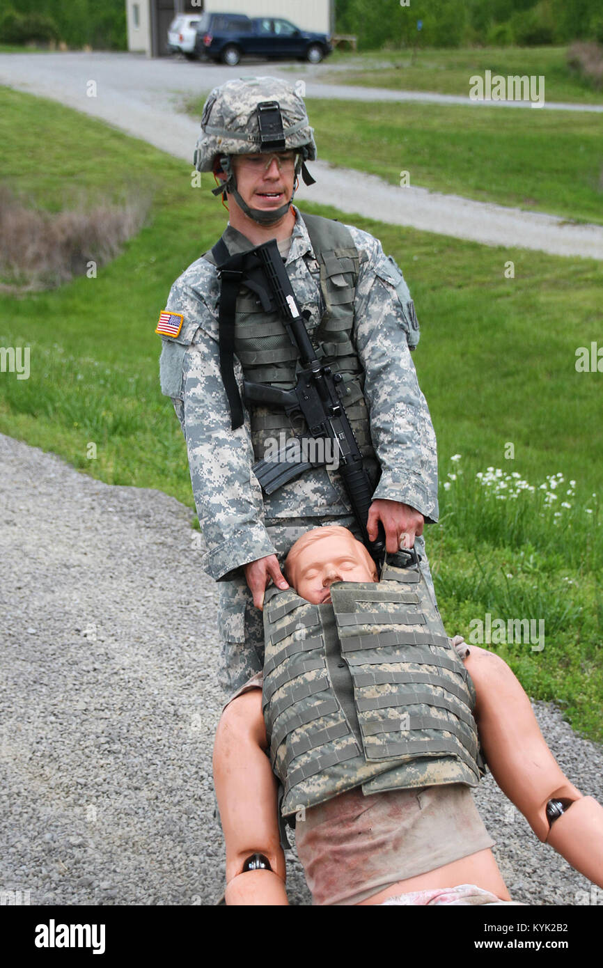 Spc. Richard Lively with the Georgia National Guard drags a dummy at ...