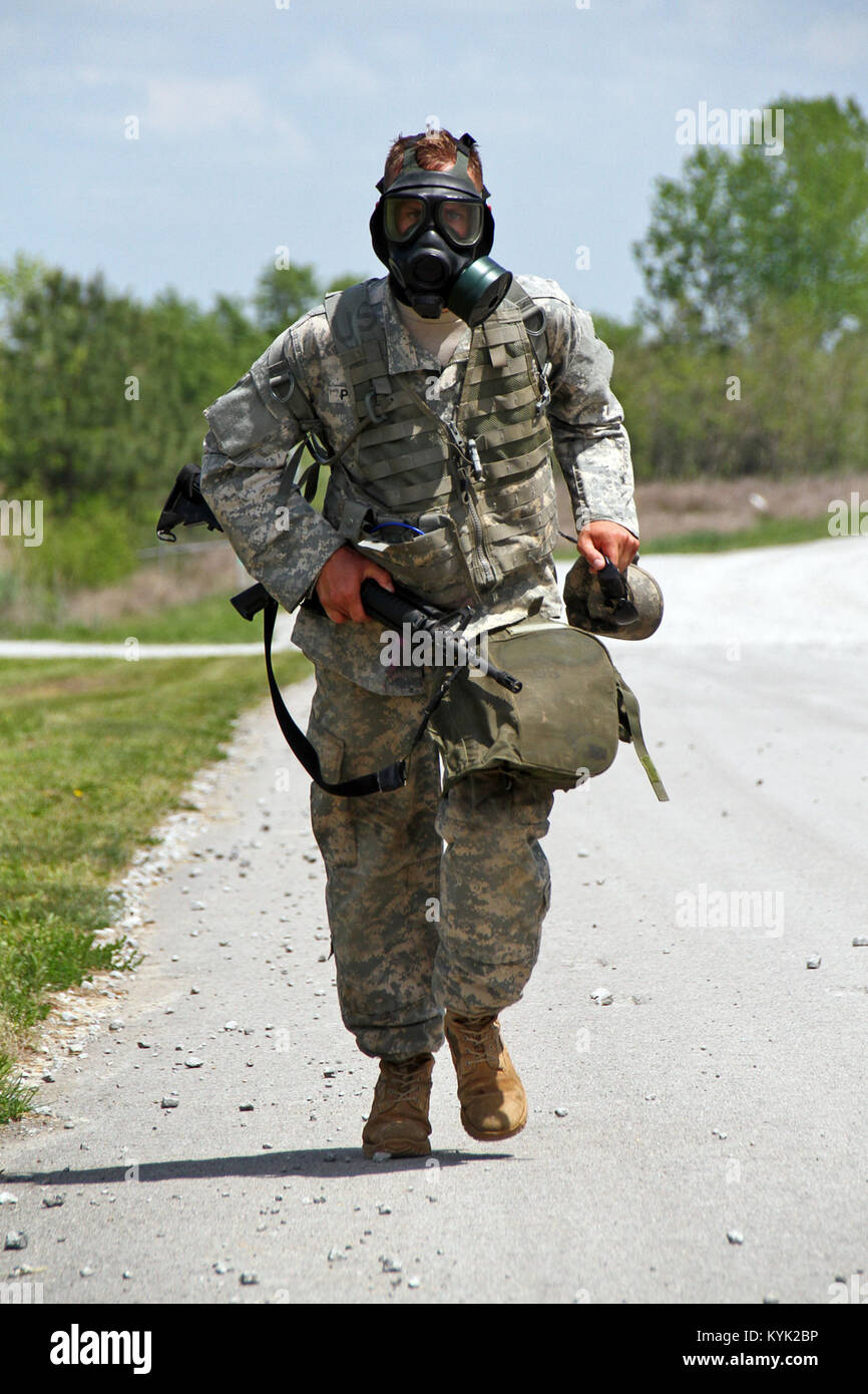 Spc. Stanley Powell with the Mississippi National Guard competes in the ...