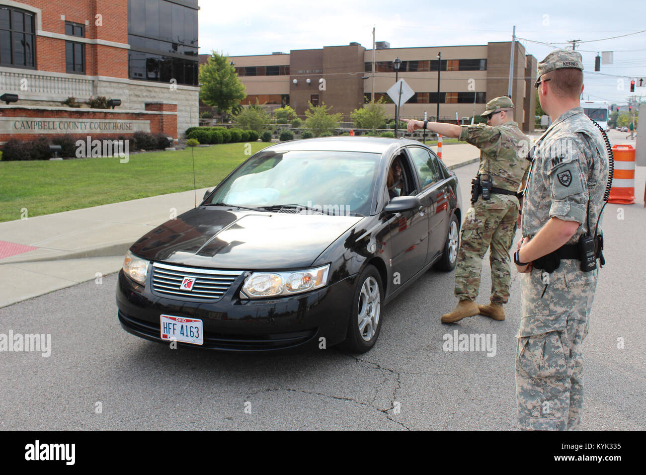 Sgt. Mason from the 940th Military Police company gives directions to a ...