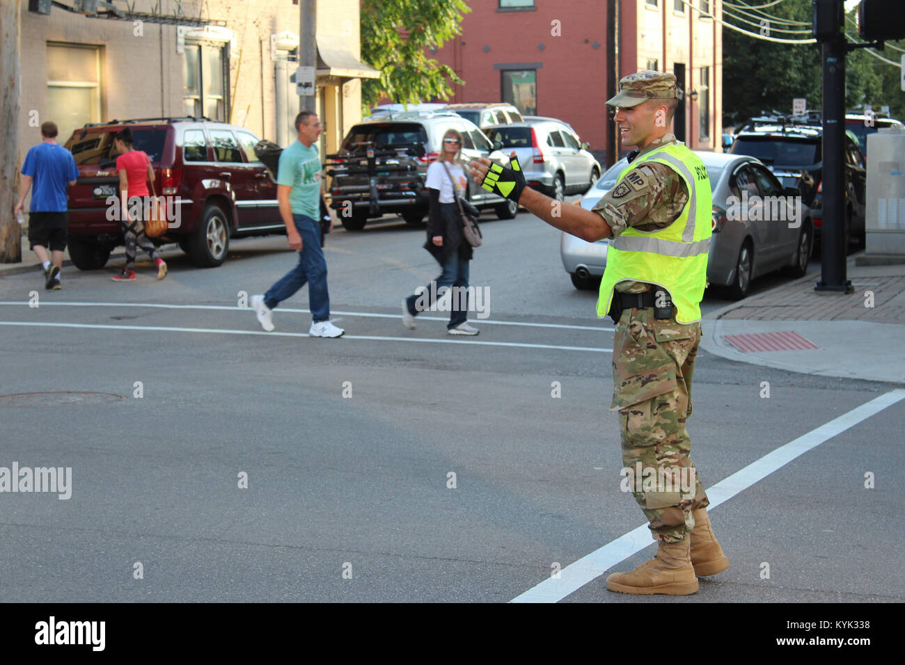 Spc. Courtney directs traffic ensuring the safety of motorists and ...
