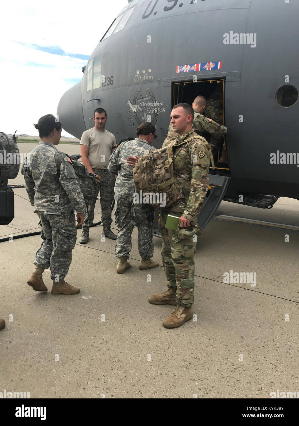 US Army National Guard board Hercules C-130 aircraft Stock Photo - Alamy