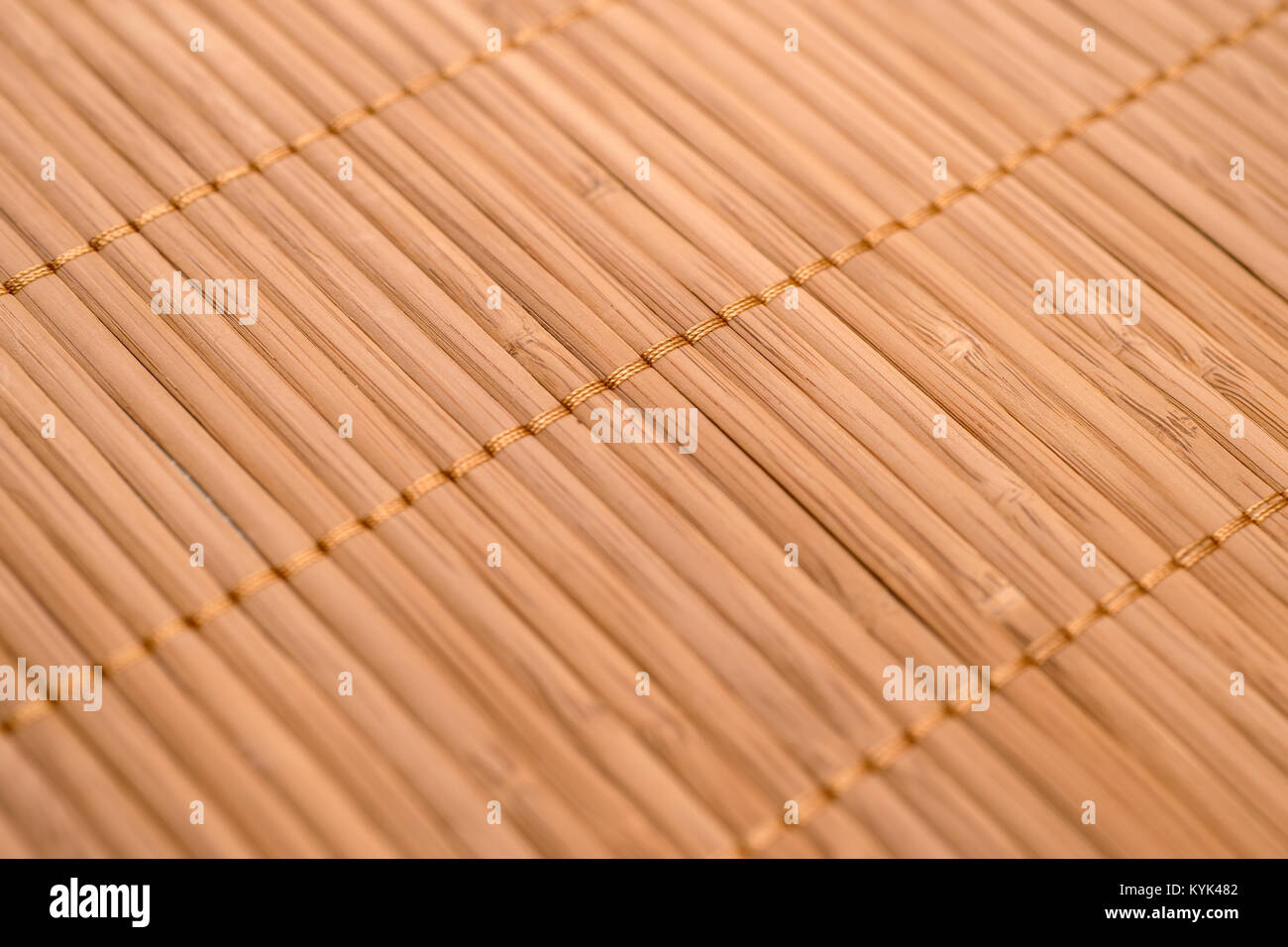 Bamboo mat close up with selective focus. Wooden texture and background ...
