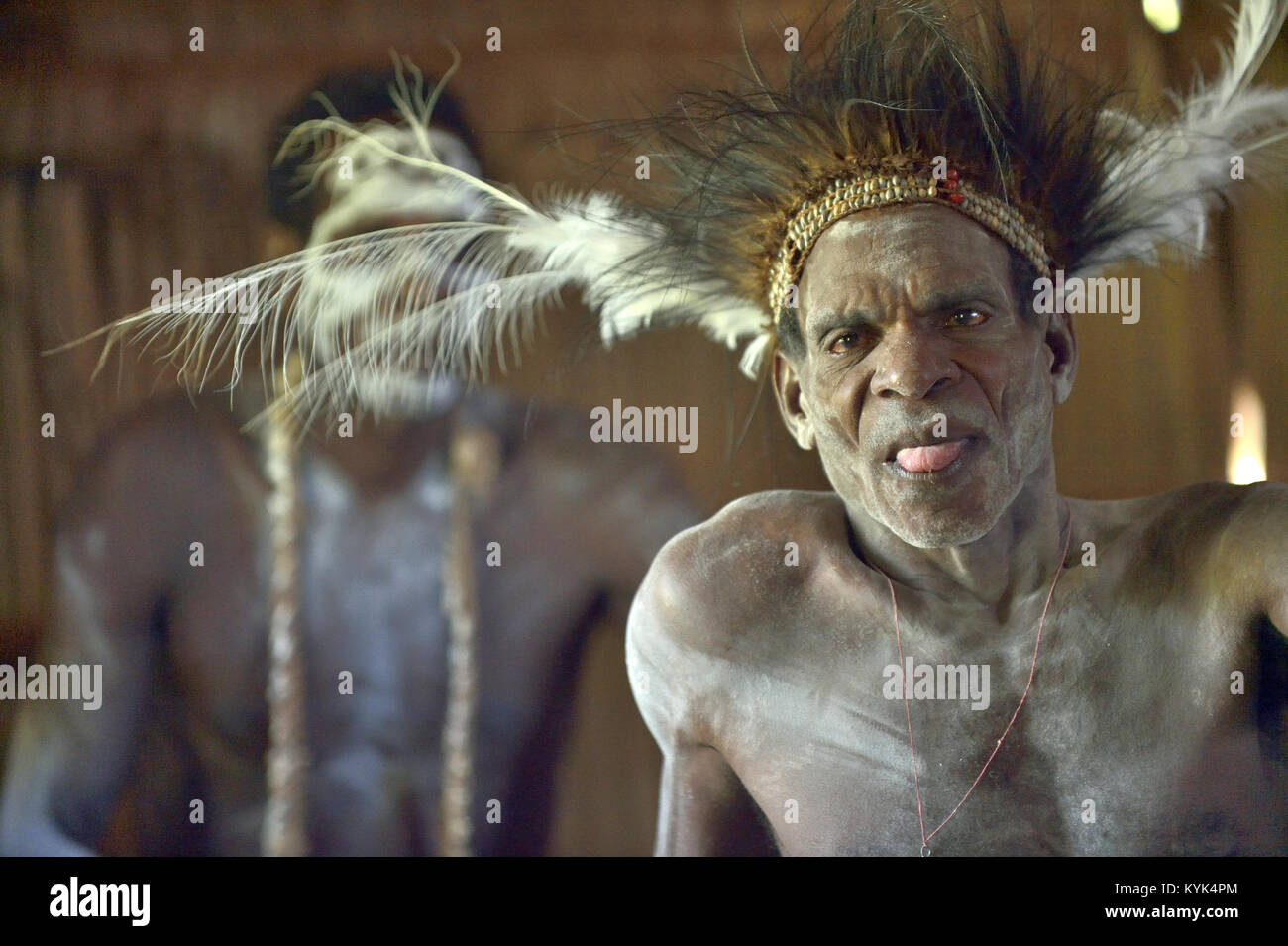 Portrait of a man from the tribe of Asmat people on Asmat Welcoming ...