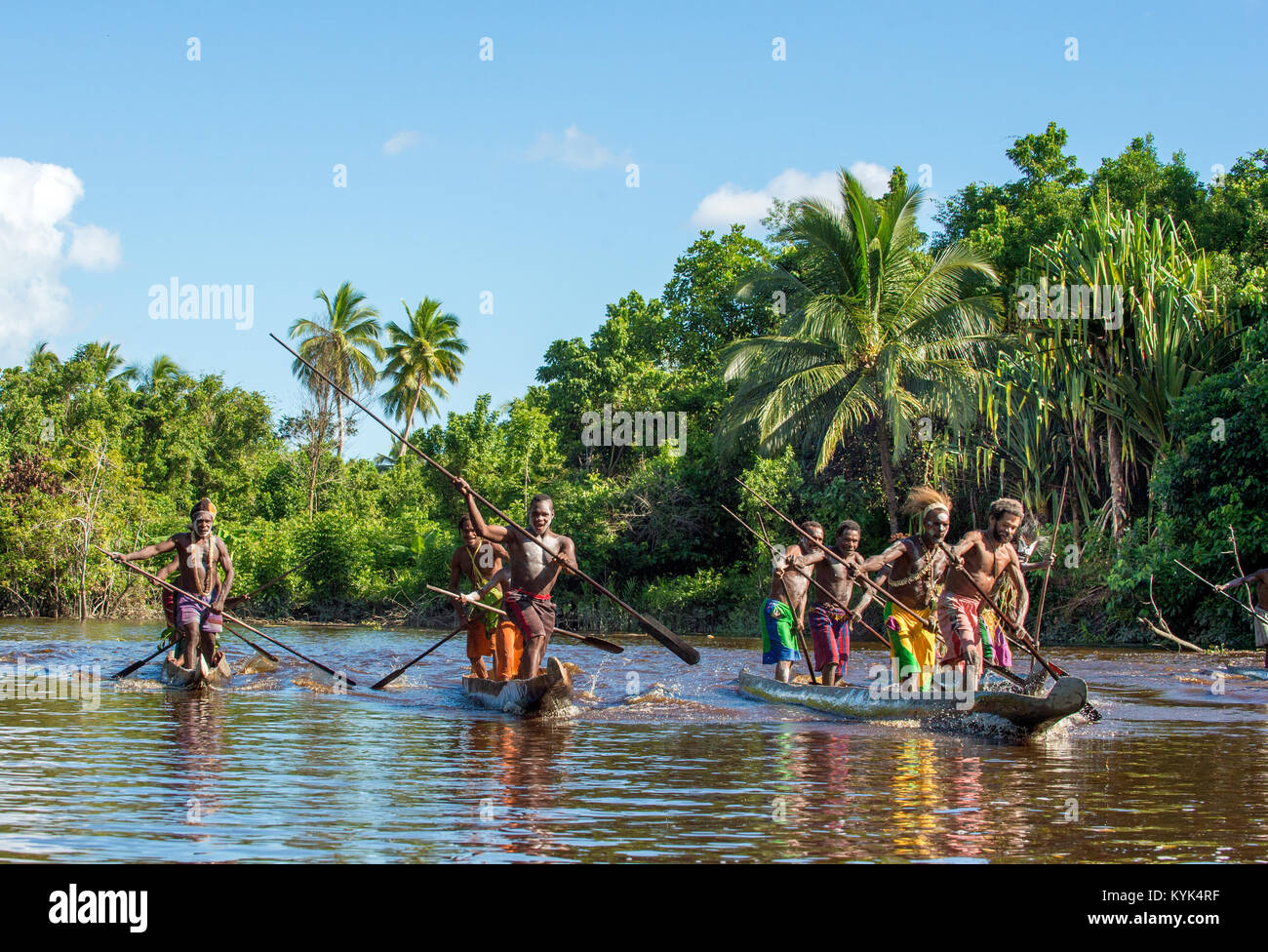Canoe war ceremony of Asmat people. Headhunters of a tribe of Asmat ...