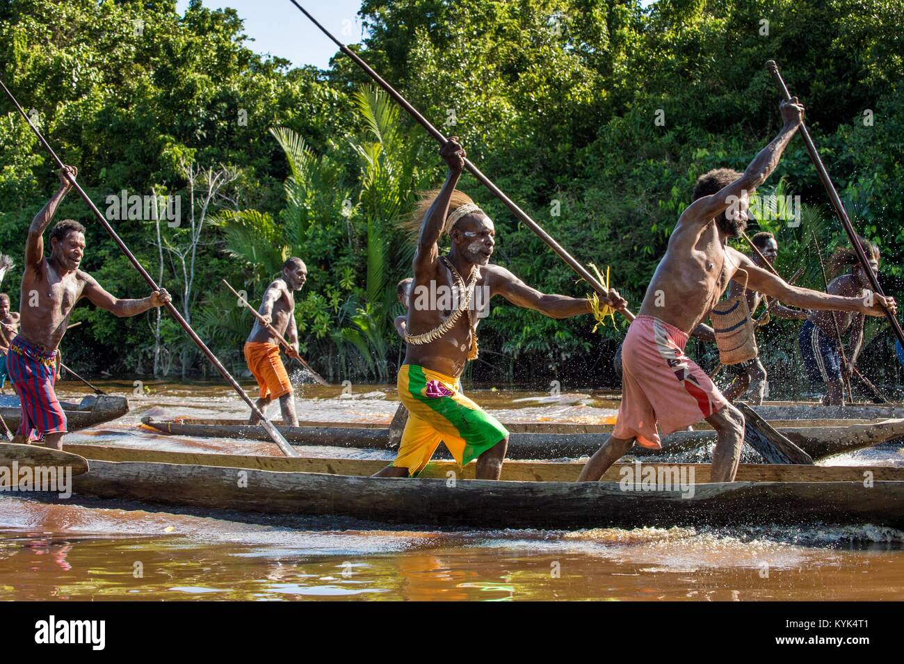 Canoe war ceremony of Asmat people. Headhunters of a tribe of Asmat ...