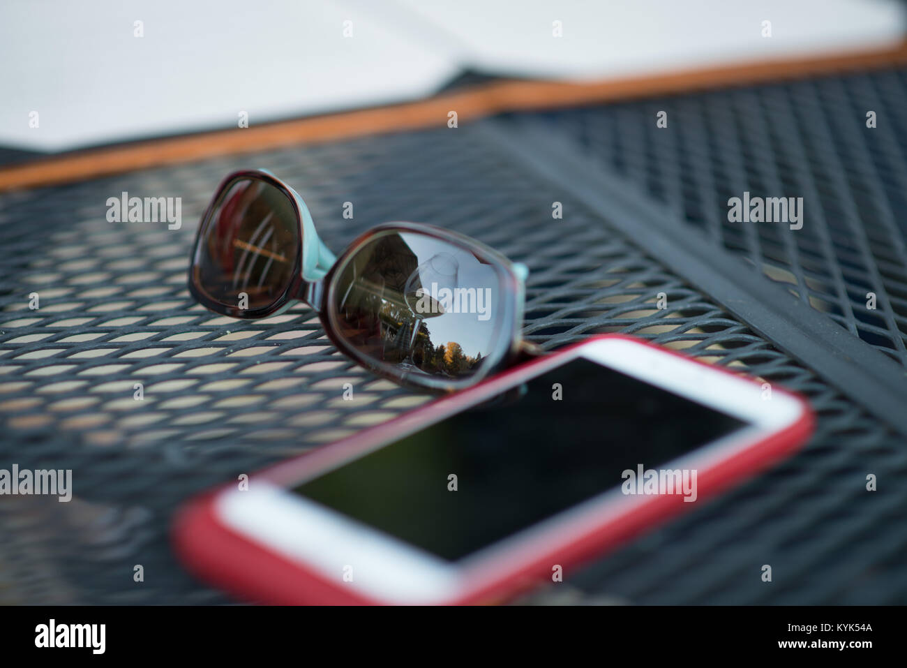 Cellphone and Sunglasses Stock Photo - Alamy