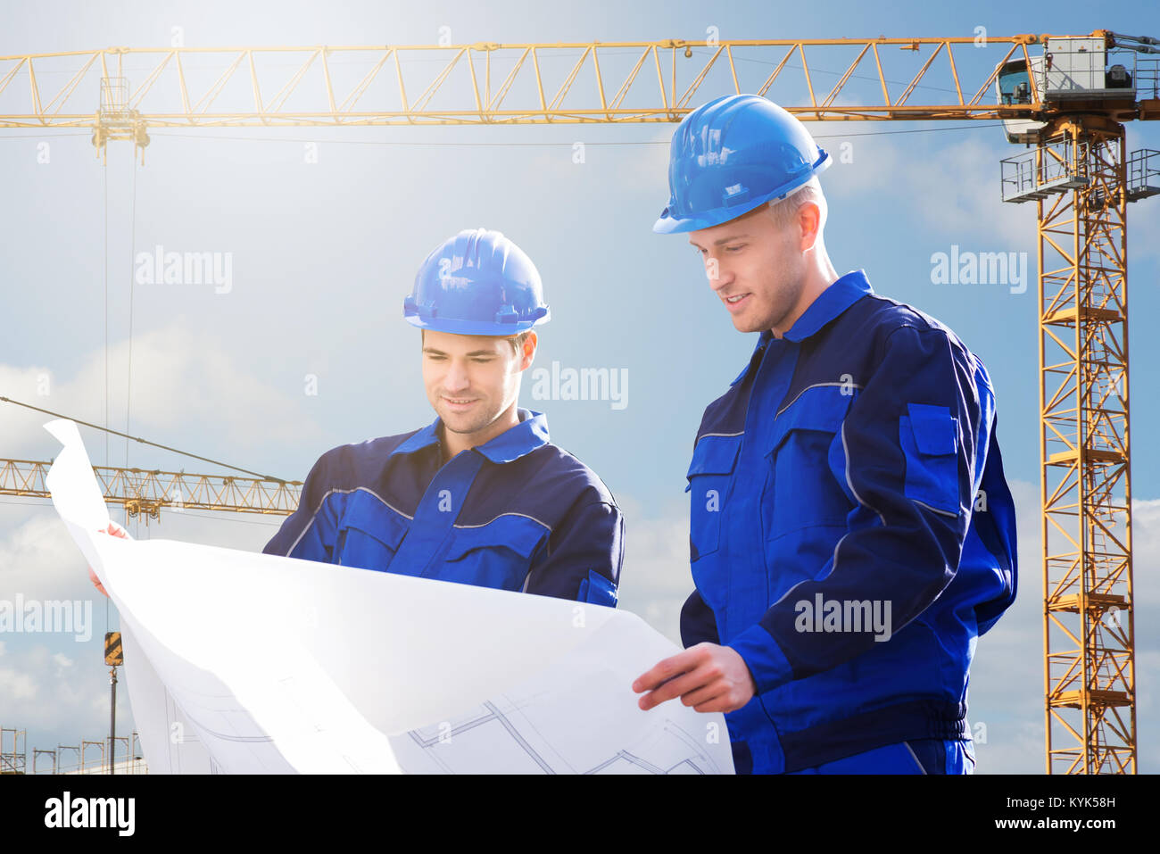 Looking at blueprints hi-res stock photography and images - Alamy