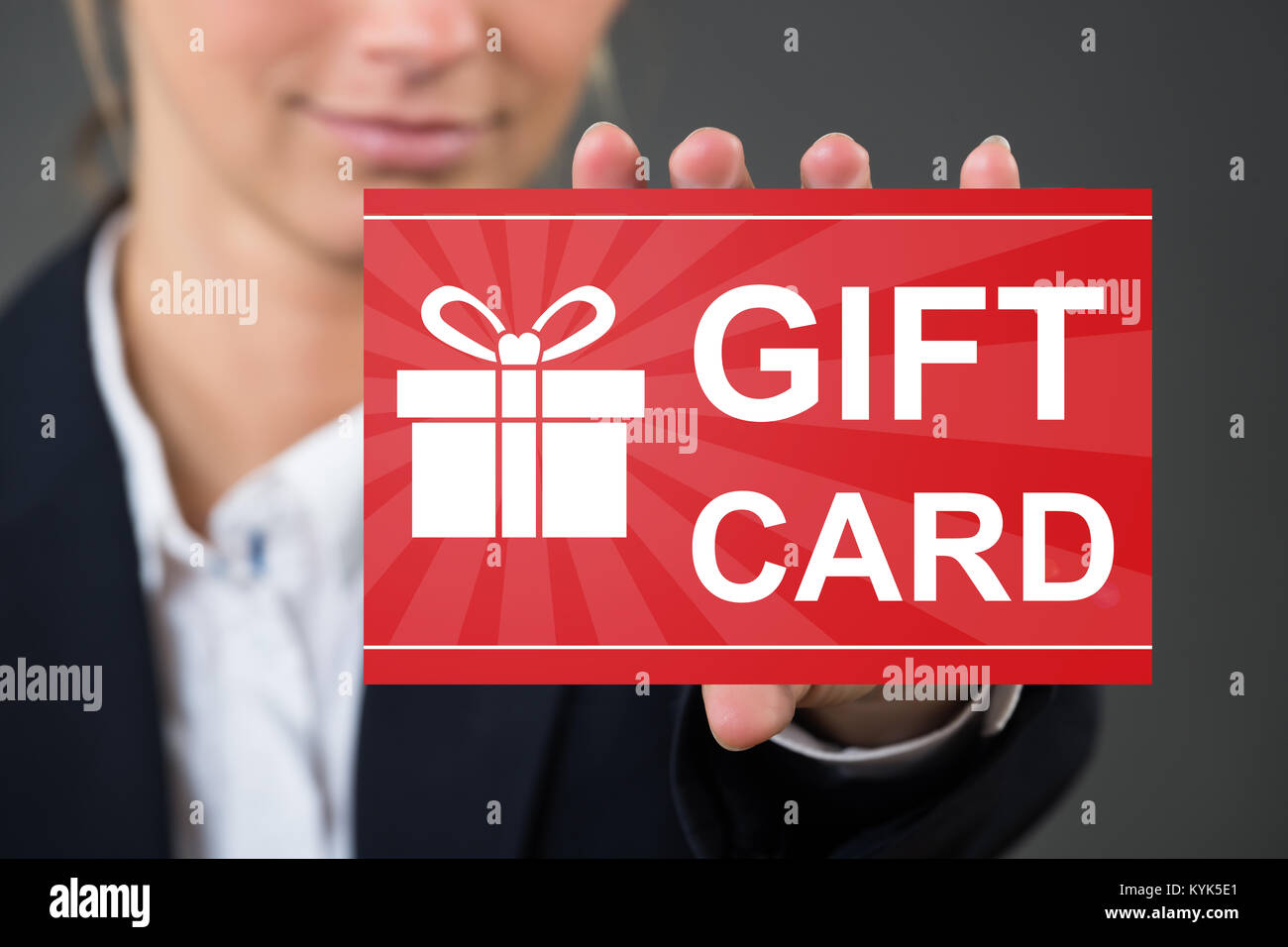 Closeup Of Woman's Hand Holding Gift Card Stock Photo - Alamy