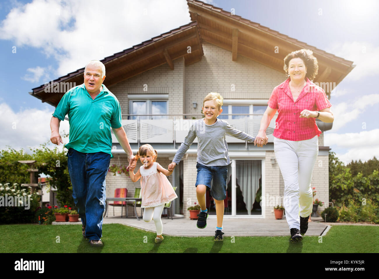 Grandparent and child running hi-res stock photography and images - Alamy