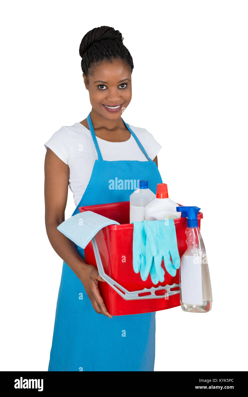 Portrait Of Smiling Female Janitor With Cleaning Equipments Against ...