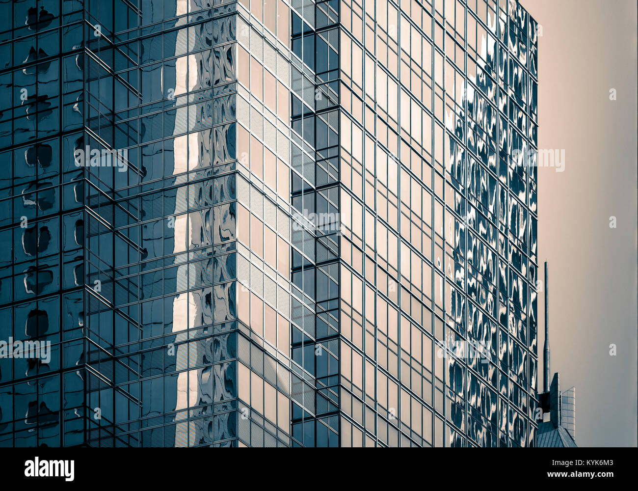 Modern office building close up in sunlight Stock Photo - Alamy