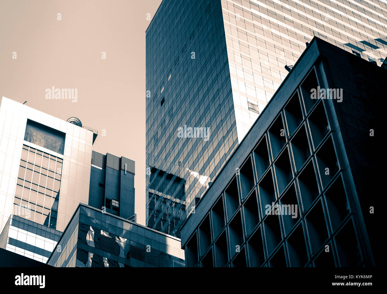 Modern office building close up in sunlight Stock Photo - Alamy