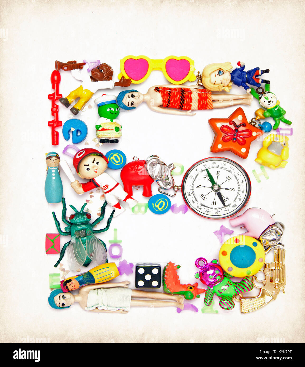 the letter B made from small toys Stock Photo - Alamy