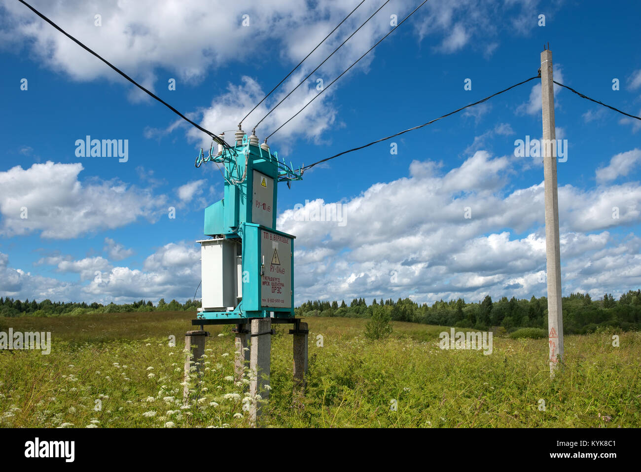 Electricity transformer substation mounted on pole in the field Stock ...
