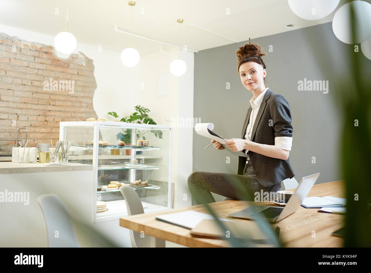 Woman organizing work Stock Photo - Alamy