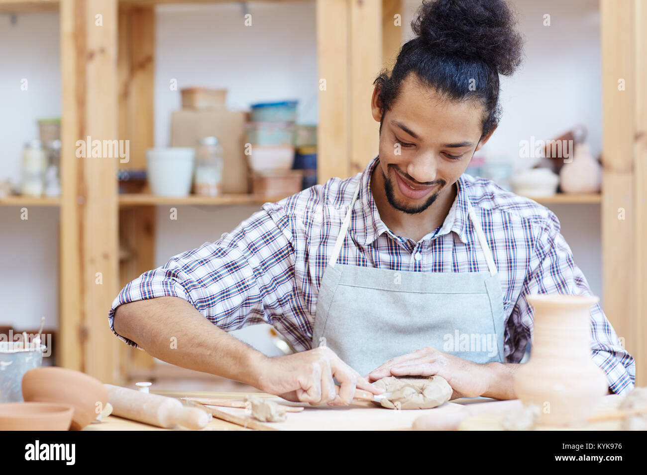 Working with clay Stock Photo - Alamy