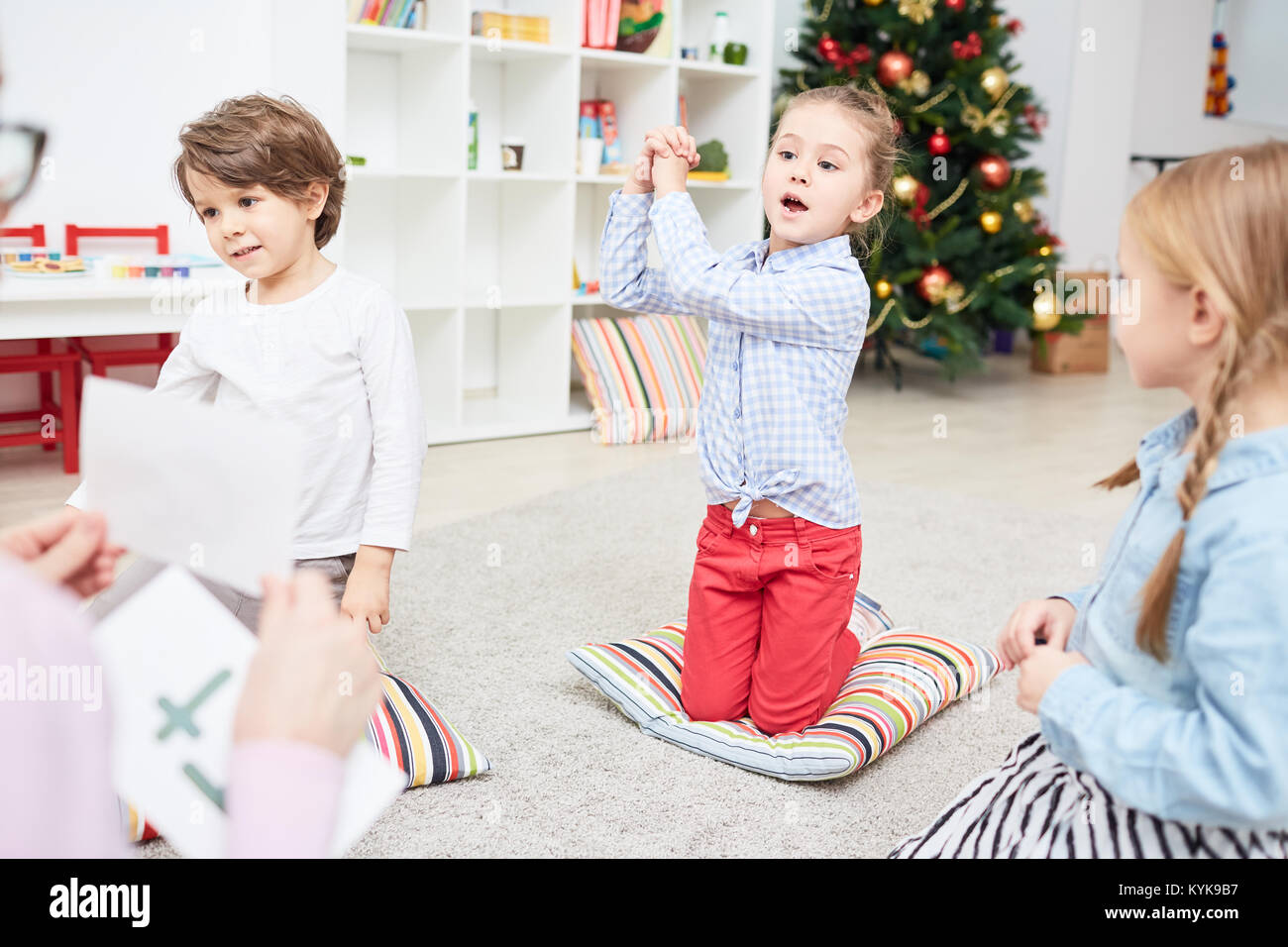 Children talking together and classroom hi-res stock photography and ...