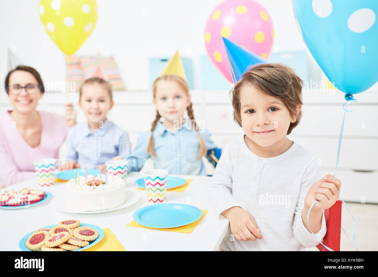 By birthday table Stock Photo - Alamy