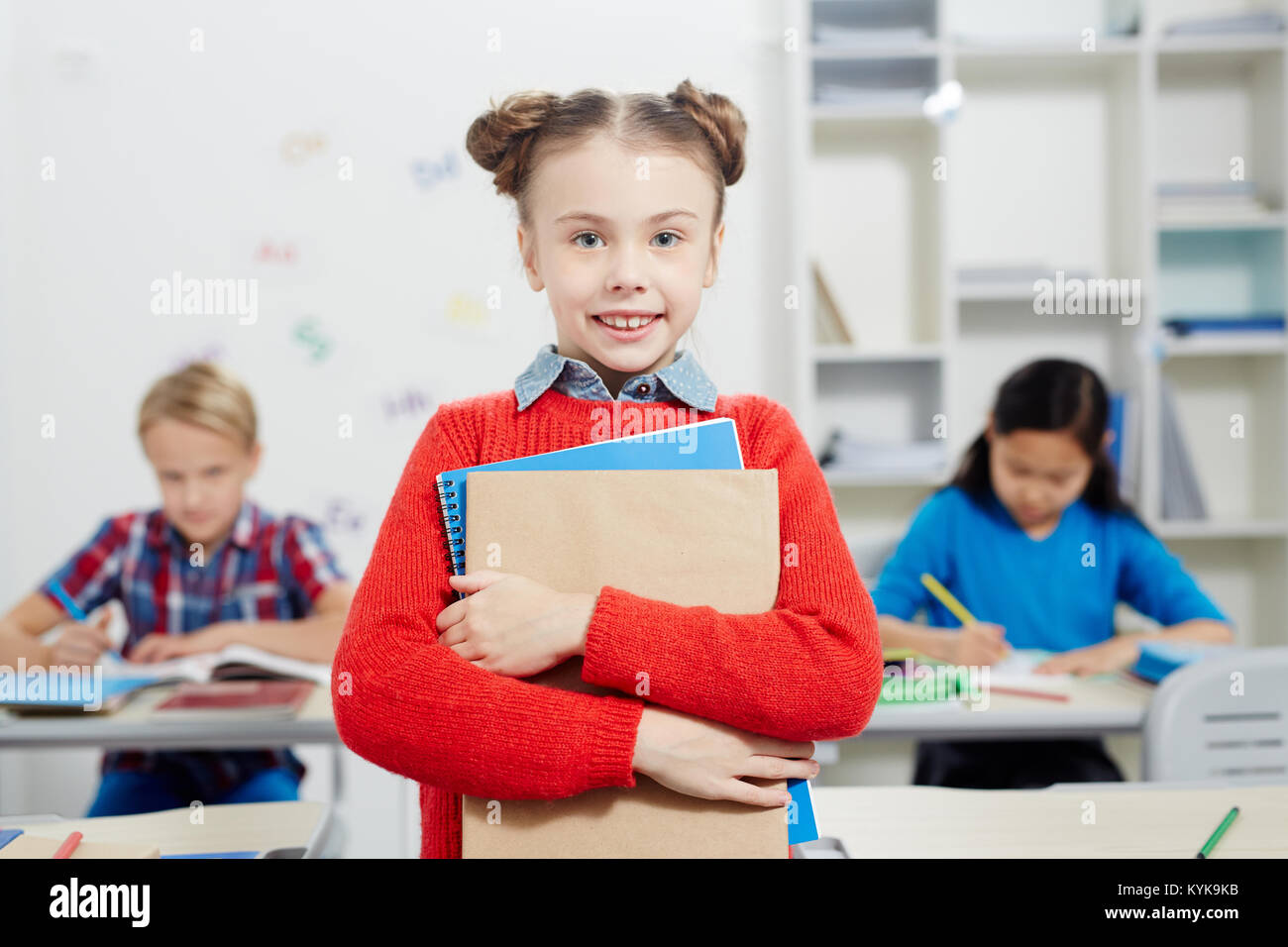 Cute primary school student looking hi-res stock photography and images ...