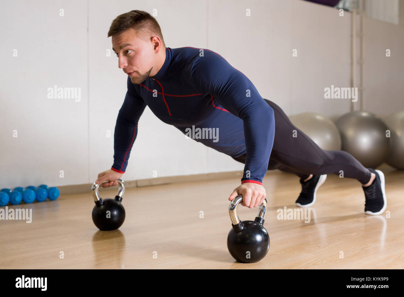 Sporty young man exercising hi-res stock photography and images - Alamy