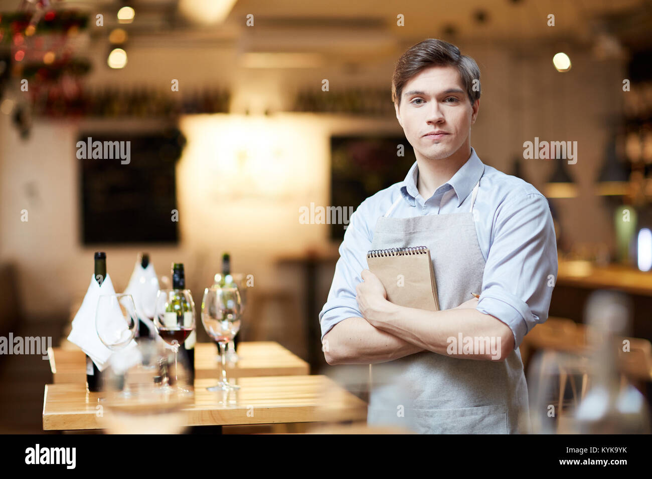 Waiter in restaurant Stock Photo - Alamy