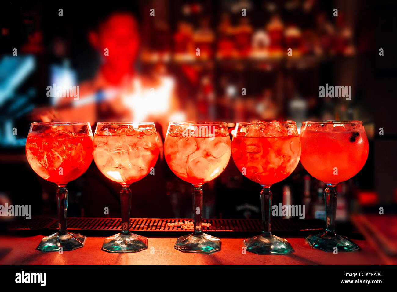 Vibrant Cocktail Selection at the Bar with Colorful Garnishes and Stylish Glassware in a Modern ...